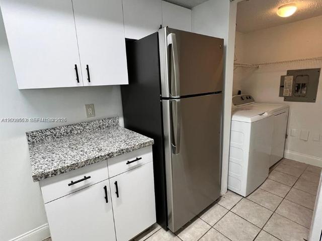 Evergreen Lakes Condominium, Coconut Creek, FL 33073 | MLS #A12009 | Compass