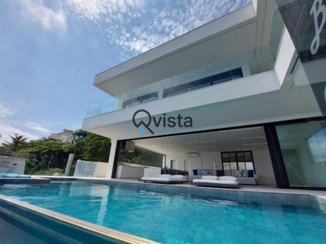 Excelente Casa á venda na Península no Guarujá | QVista Inteligência Imobiliá.