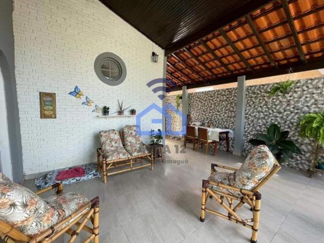 Excelente Casa à venda localizada a poucos metros da praia do Indaiá em Caraguatatuba, SP