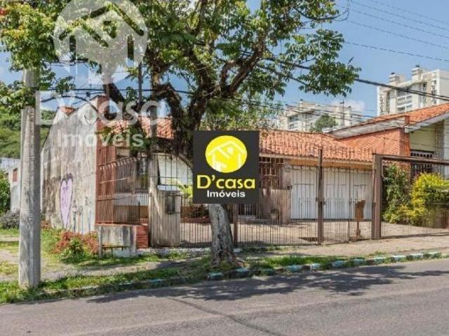 Excelente casa com 3 dormitórios à venda, 243 m² por R$ 930.000 Jardim Lindóia Porto Alegre/RS
