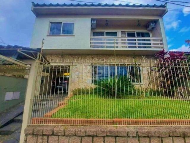 Excelente casa com 3 dormitórios e 3 vagas de garagem