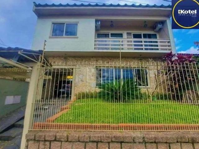 Excelente casa com 3 dormitórios e 3 vagas de garagem