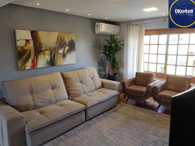 Excelente casa com 03 suíte, espaço gourmet com churrasqueira, living com lareir