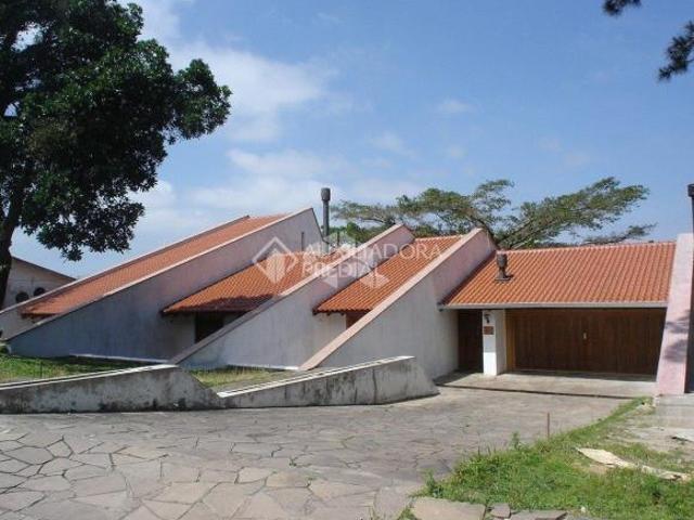 Excelente Casa com arquitetura diferenciada para fins residencial/comercial com 4 suítes Jdim Isabel