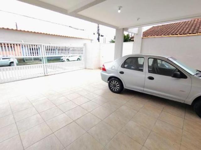 Excelente casa de condomínio sobreposta alta com quintal reservado e amplo espaço para dispensa com
