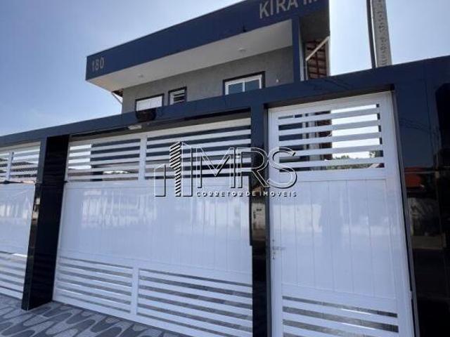 Excelente casa de condomínio sobreposta baixa de 02 dormitórios, 01 banheiro social, 01 vaga de gara