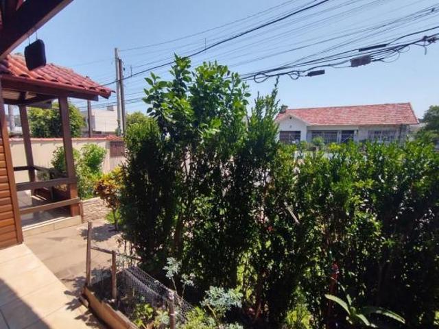 Excelente casa de madeira