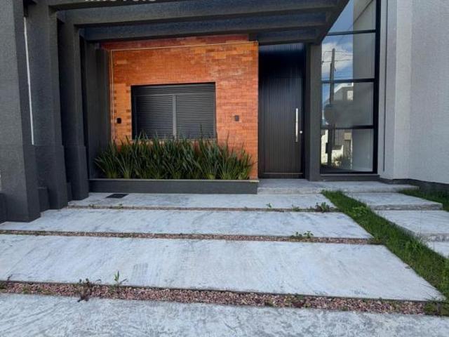Excelente casa em condomínio, à venda no bairro Vale Ville Gravataí/RS