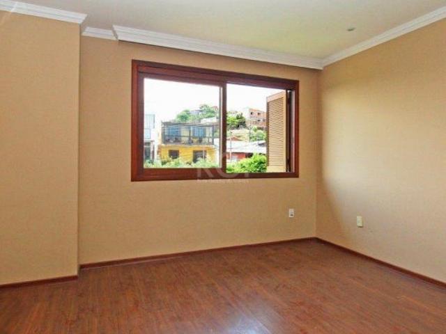 Excelente casa em condomínio com três 3 dormitórios, uma 1 suíte, duas 2 vagas de garagem pr