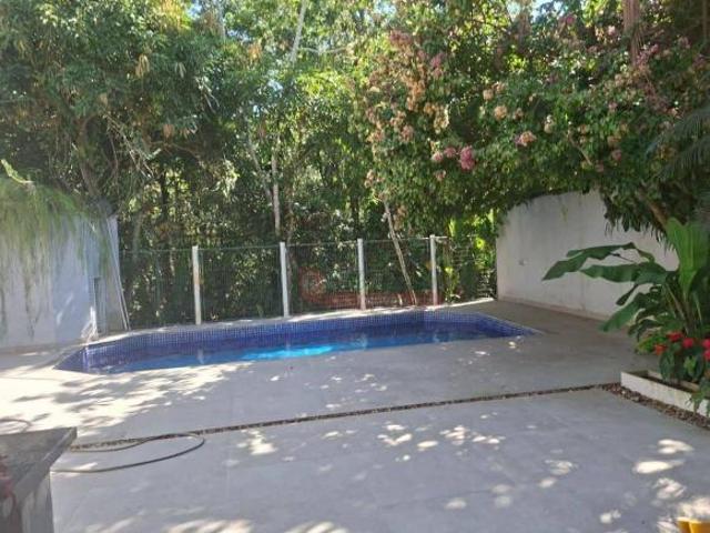 Casa com 3 dormitórios à venda, 219 m² por R$ 3.500.000,00 Riviera Módulo 24 Bertioga/SP