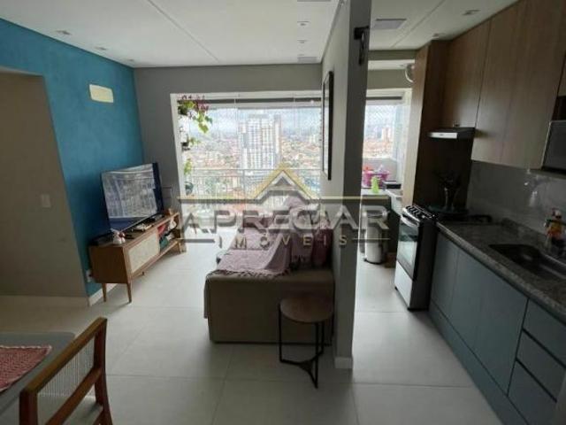 Excelente apartamento com vista livre e varanda goumert envidraçada com persianas de dois dormitóri
