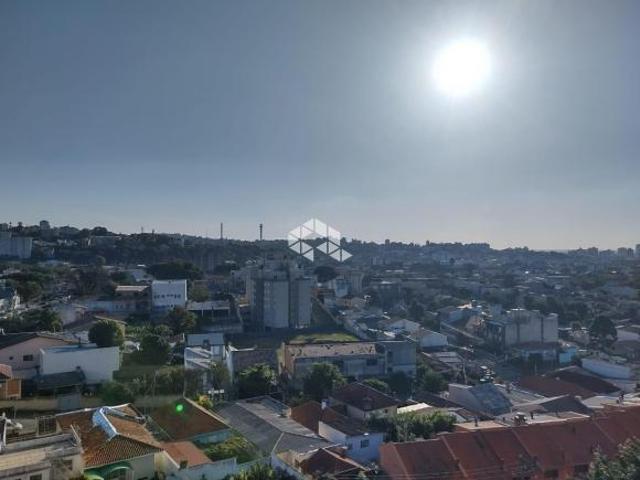 Excelente Apartamento com 2 dormitórios, suíte, móveis sob medida, andar alto, vista, sol, iluminado