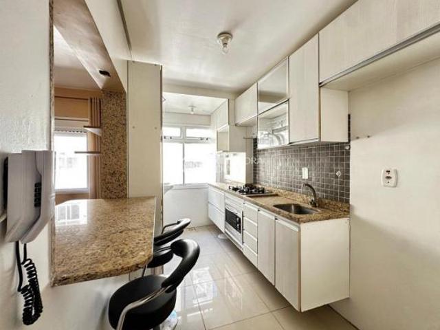 Excelente apartamento mobiliado á venda com 2 quartos,1 vaga de box ótima localização