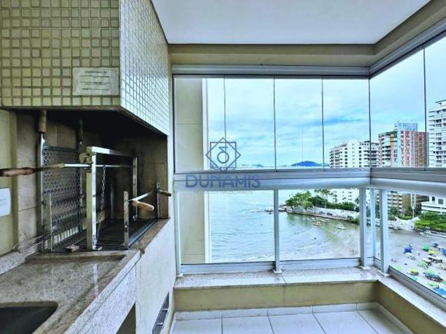 EXCELENTE APARTAMENTO NA PRAIA DAS ASTÚRIAS FRENTE MAR COM LAZER COMPLETO