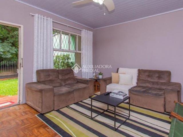 Excelente oportunidade casa com 3 quartos, vaga para 3 carros no bairro Jardim Botânico!