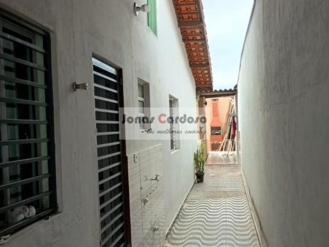 Excelente oportunidade: Casa à venda em Mogi das Cruzes, Jardim Layr! 2 quartos, 2 salas, 2 banheiro