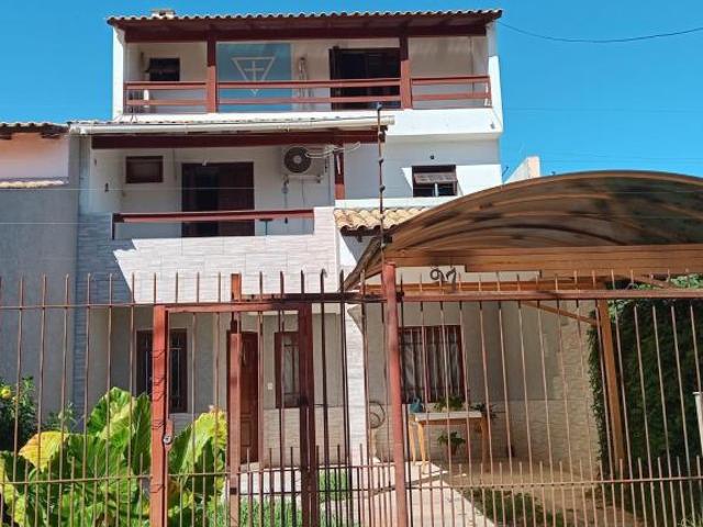 Excelente oportunidade de adquirir um sobrado no charmoso bairro Guarujá