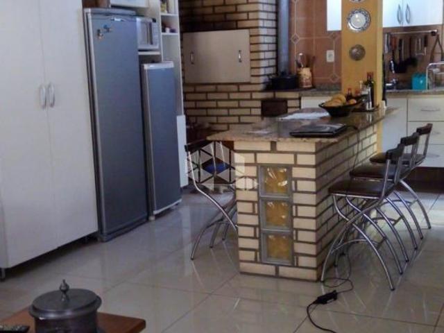 Excelente Sobrado 04 dormitórios para venda no bairro Nonoai