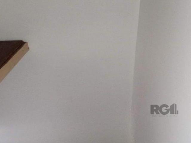 Excelente sobrado em condomínio com 2 dormitórios, living 2 ambientes, banheiro social, lavabo, c