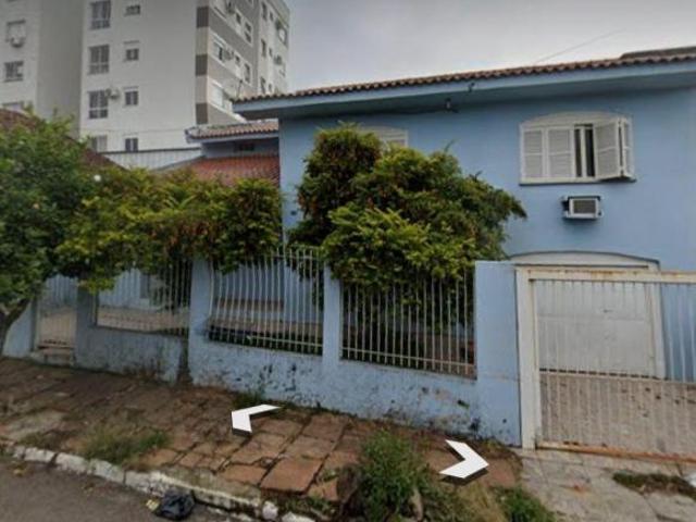 Excelente residência 2 dormitórios, 1 suíte, 2 vagas de garagem no bairro Rosári