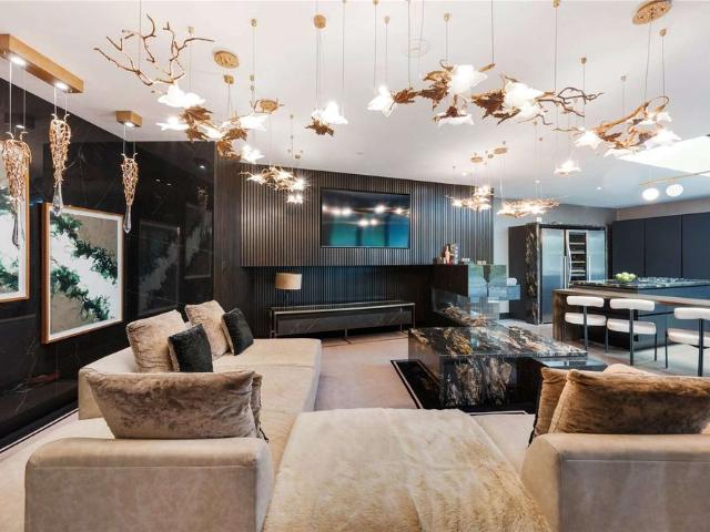 Exceptional turnkey residence offering over 6,000 sq ft of luxurious accommodation, complete with cinema room, gym, sauna and games suite, in the heart of Hale Barn