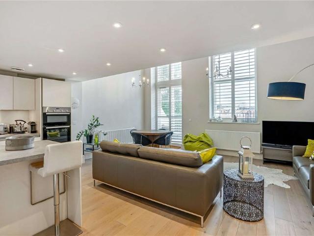 Exceptional Waterfront Apartment with Private Balcony and Home Office