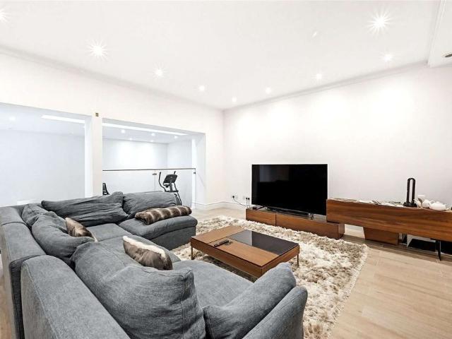 Exceptional Freehold Family Residence with Private Garden and Balcony Overlooking Prestigious Garden Square