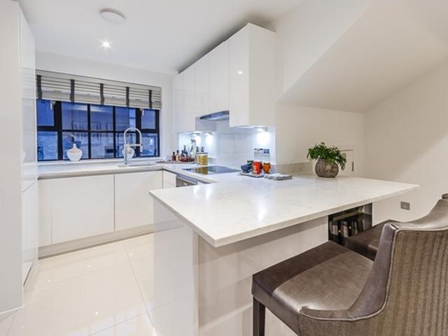 Exceptional Second Floor Two Bedroom Apartment with Private Terrace & River Views