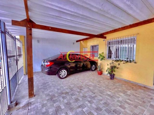Exclusivo Sobrado de 140m² com 3 Dormitórios Próximo ao Shopping Maia, Pronto para Morar