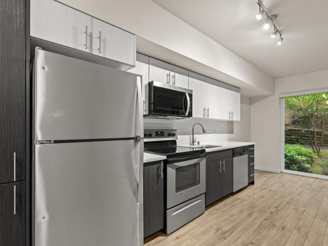 Exclusive Offer: 6 Weeks FREE Rent! Stylish 1 Bedroom Apartment with In Unit Washer and Dryer, Fitness Center and Garage Parking Tour now!