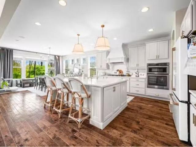 Executive home with 4 bedrooms and 5.5 bathrooms. Center Grove.