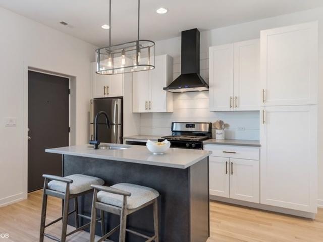 Expansive 3BR Duplex in Noble Square with Parking & Deck