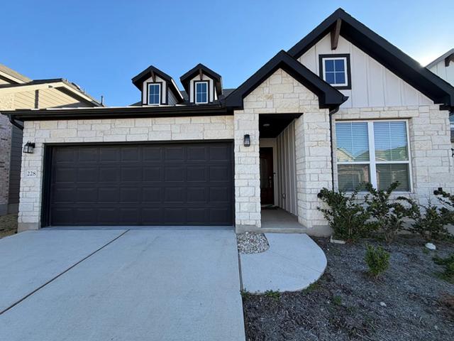 Experience a seamless, turnkey lifestyle in this sophisticated 5 bedroom, 4 bathroom executive residence in Leander's desirable Horizon Lake community.