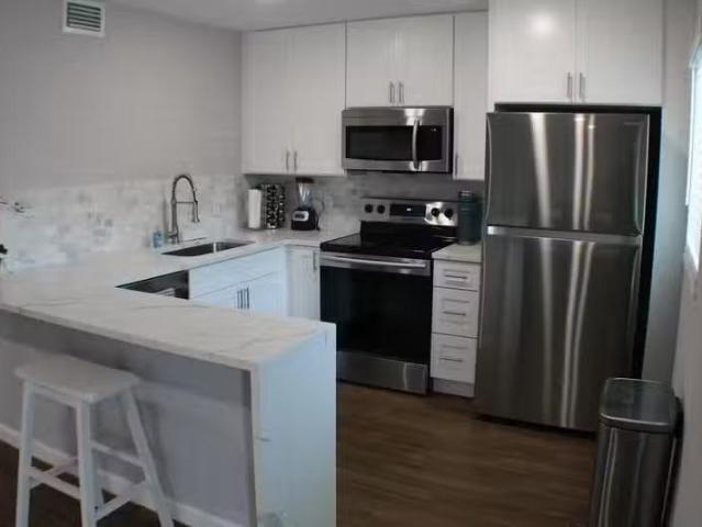Experience a rare opportunity to rent a 1st floor 1600 8th St