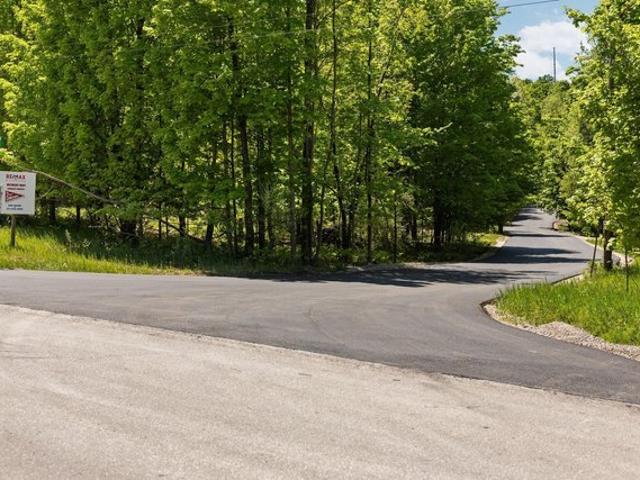 F Retreats Way, Rapid City, MI 49676