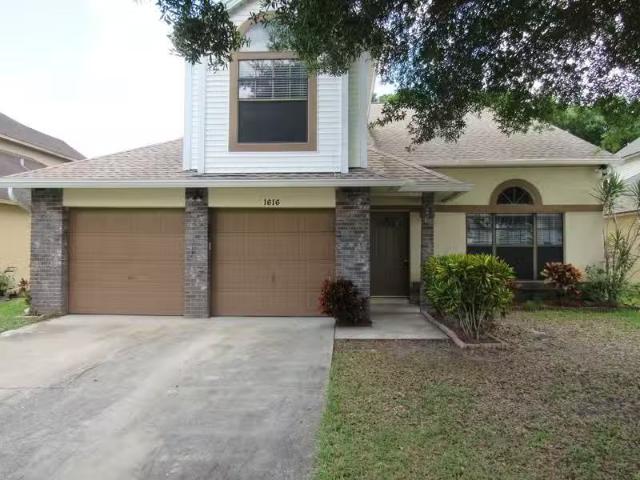 Fabulous 3/2 with Privacy Fence and Bonus Room in Melbourne FL.