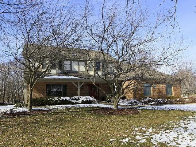 FABULOUS HOME ON PRIVATE WOODED CUL DE SAC LOCATION