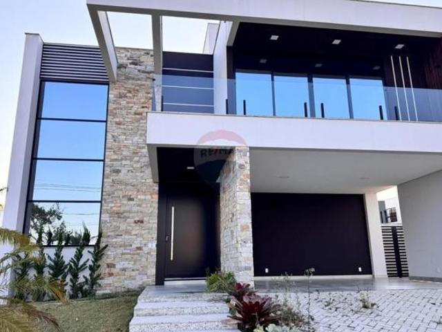 Fachada Imponente, Área Gourmet Integrada e 4 Suítes, Sua Casa dos Sonhos em Alphaville