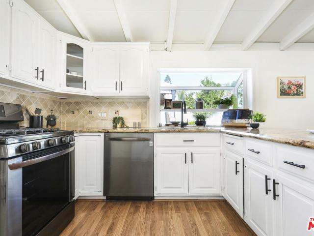 Fall in love with the chic character of this stunning abode