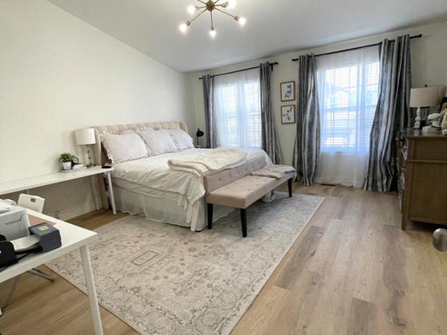 FEMALE MASTER BEDROOM WITH PRIVATE BATHROOM AND W