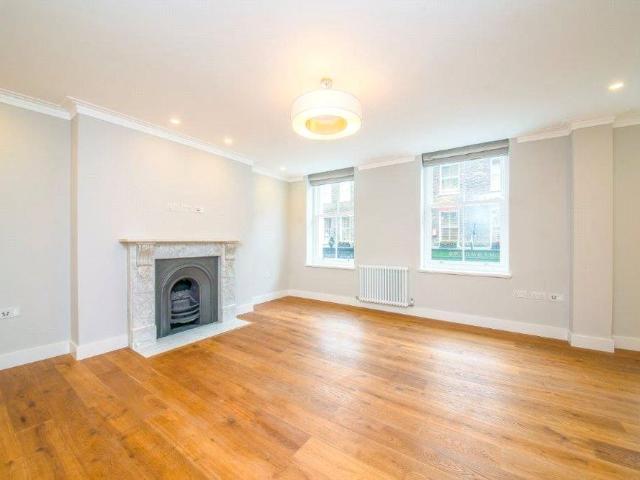 First floor, two bedroom apartment with wood floors throughout set within the Portman Estate
