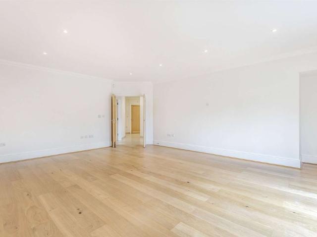 First floor, two bedroom gated apartment with two underground parking spaces, located 0.3 miles from Sunningdale Station and the local supermarket