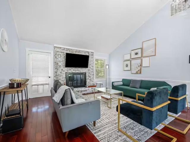 Five bedrooms and 3 full bathrooms 2 Decks front and back and a large backyard Full kitchen and a kitchenette 2 car garage The master bedroom has a king bed, while the other bedrooms have queen, king, 3 full beds and 1 twin bed.