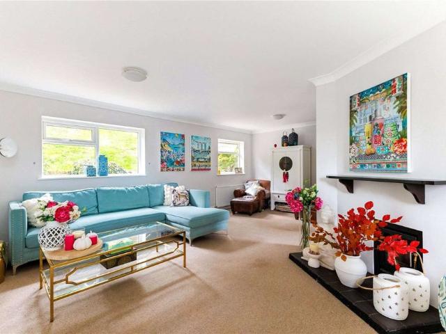 Four bedroom family home set in an elevated position, located approximately 0.6 miles from Reeds School