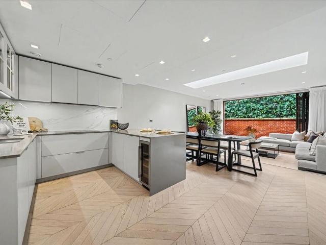 Four bedroom house offering beautifully appointed interiors, generous private terraces, and tranquil garden views