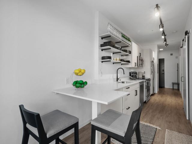 Floor to Ceiling Windows, Designer Finishes, Walk in Shower
