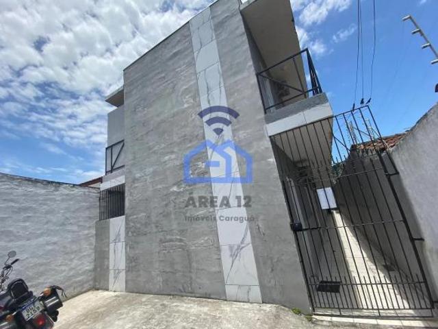Flat à venda no Centro de Caraguatatuba, SP Descubra seu novo lar a poucos passos de tudo o que vo