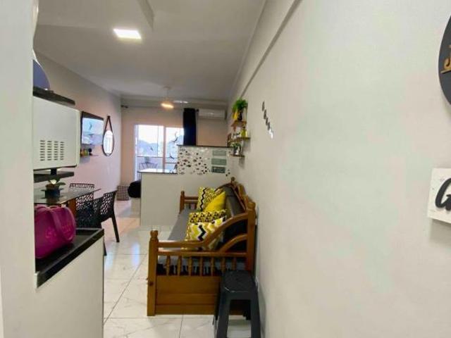 Flat à Venda na Pitangueiras no Guarujá | QVista Inteligência Imobiliária Gua.