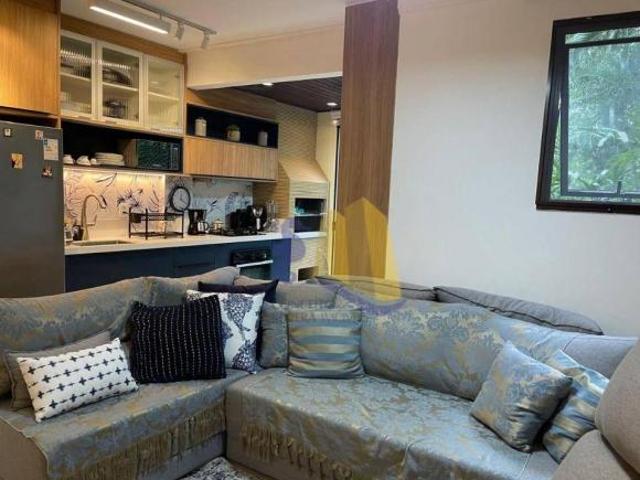 Flat com 1 dormitório à venda, 48 m² por R$ 1.200.000,00 Riviera Módulo 26 Bertioga/SP