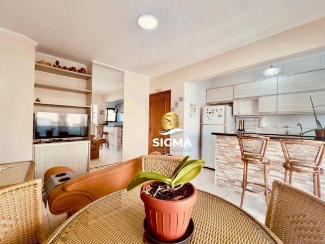 Flat com 2 dormitórios sendo 1 suíte à venda, 60 m² por R$ 530.000 Pitangueiras Guarujá/SP